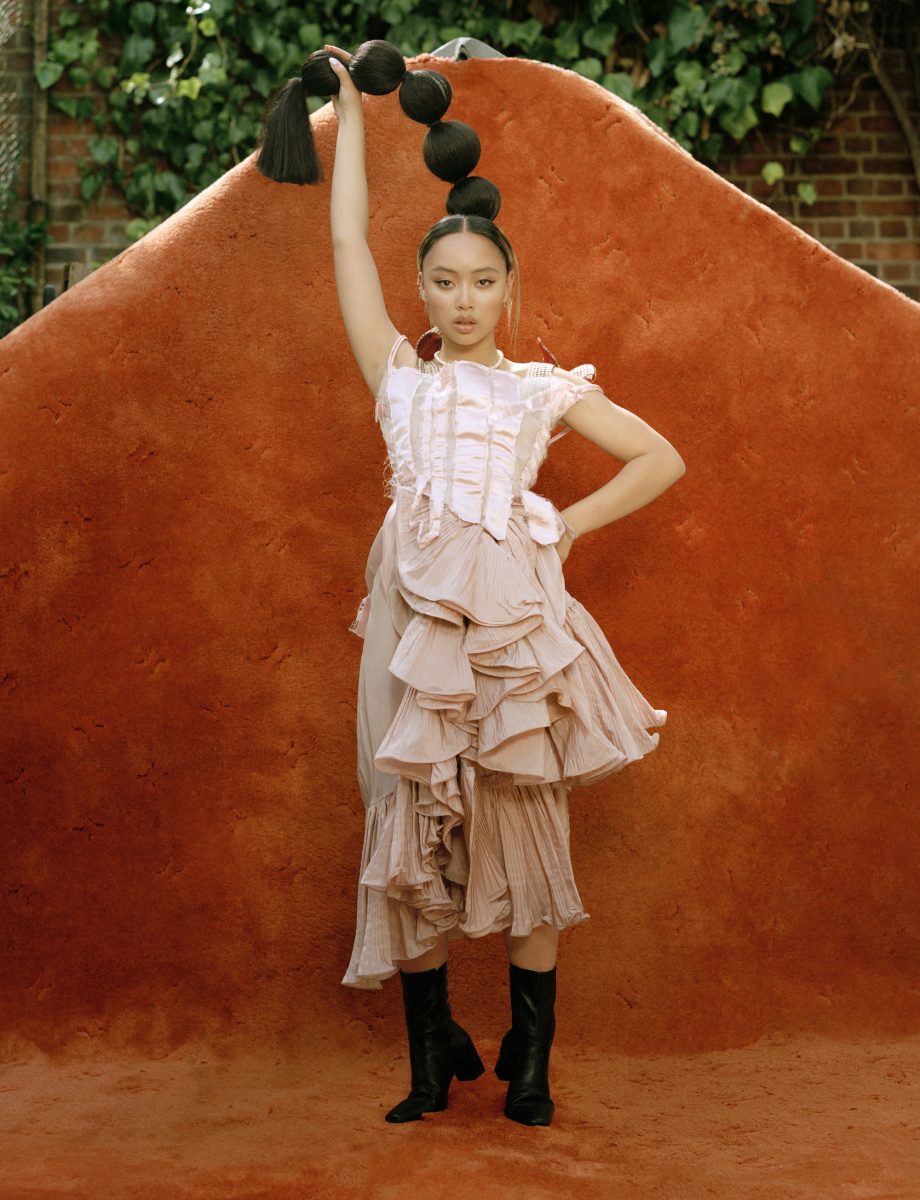 Griff wearing pink ruffle dress – Wonderland